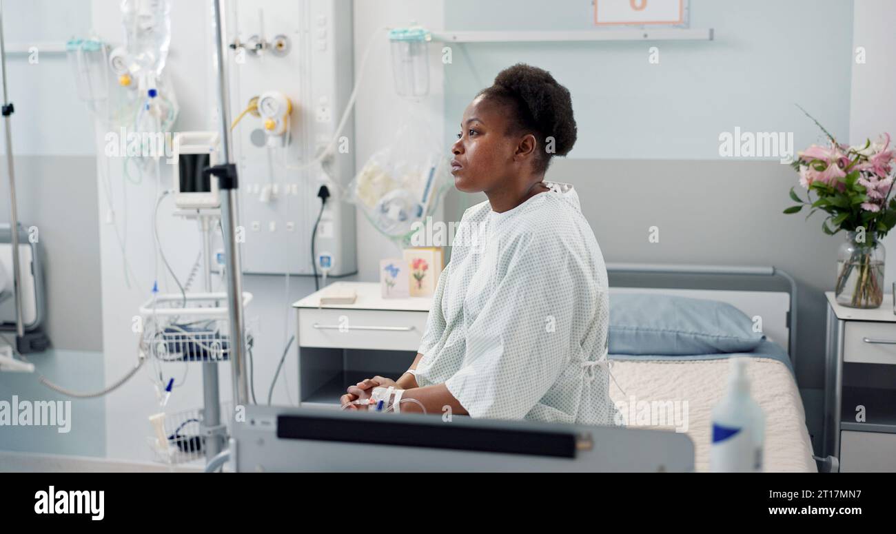 Patient, hospital and thinking on bed with depression, sad and ...