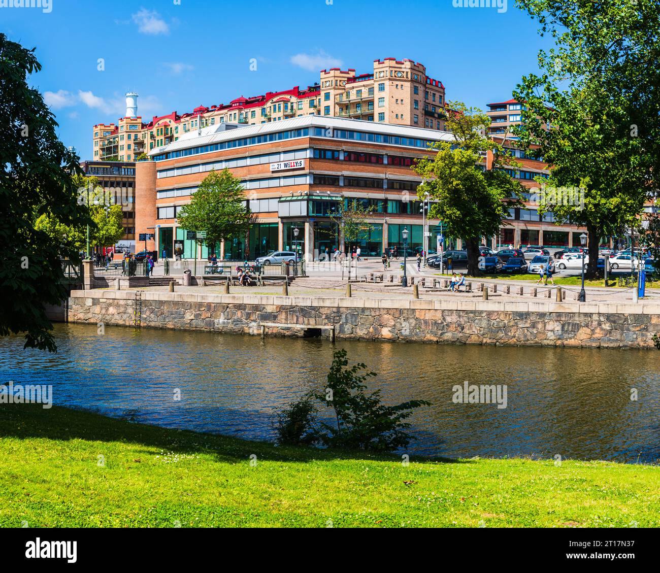 Cityscape with a waterfront building, trees, and blue sky in Gothenburg ...