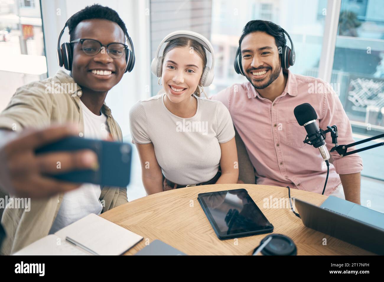 Podcast, happy and group selfie of friends together, live streaming or ...