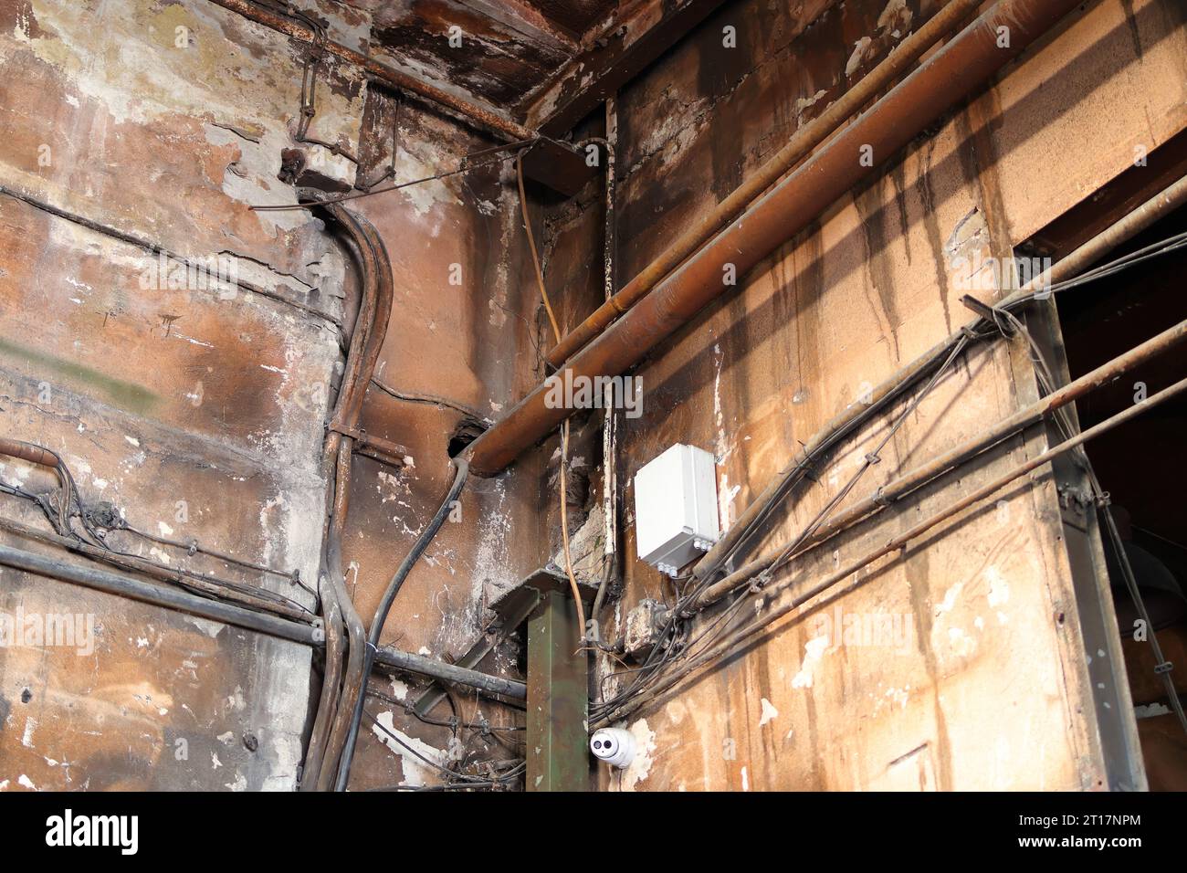 Electrical installations in an old abandoned factory Stock Photo - Alamy