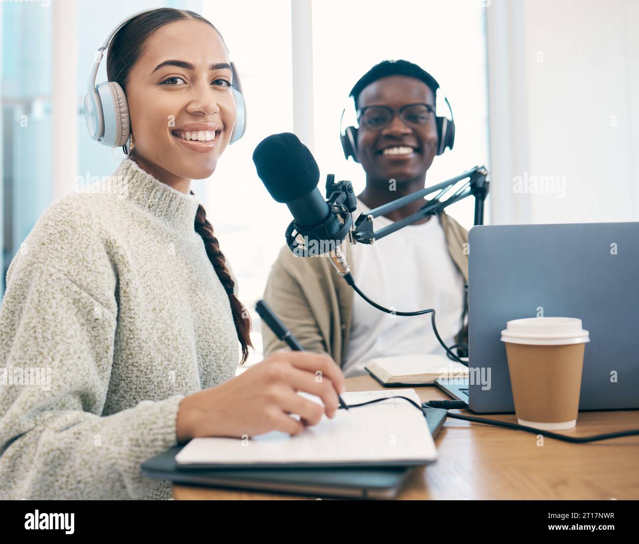 Radio, portrait and people in office writing notes for advice ...