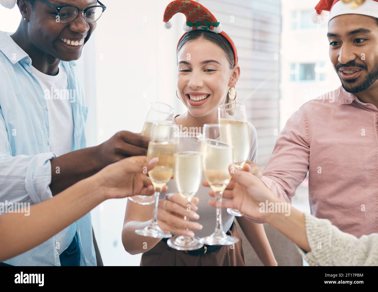 Champagne, Christmas party and toast with group of people at office ...