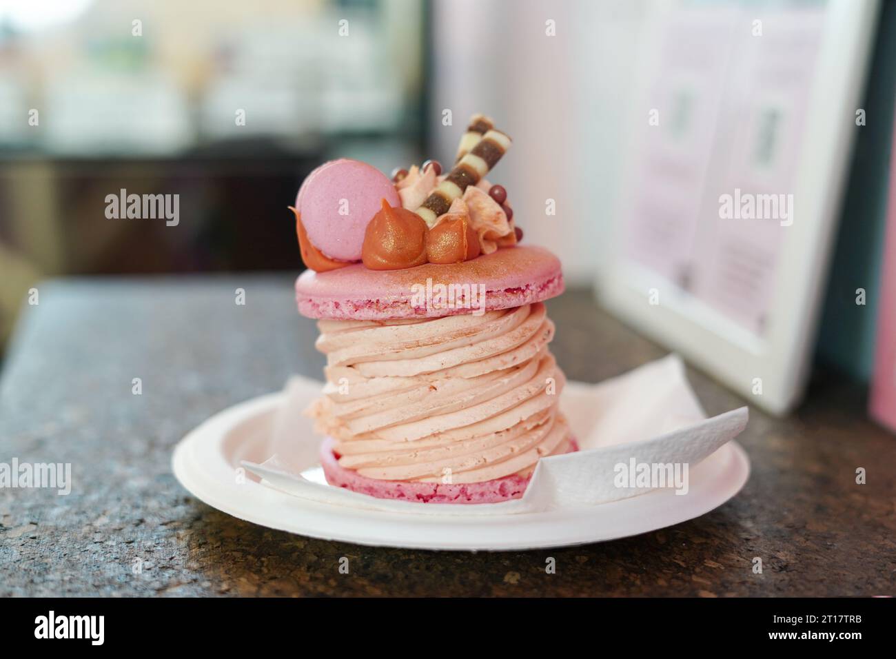 Macaroon. Delicious pink french dessert with tasty decorations ...