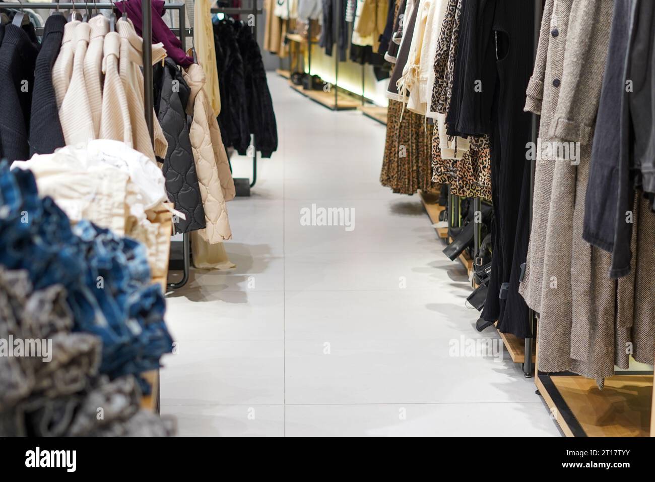 Clothing store inside shopping center, casual clothes Stock Photo - Alamy