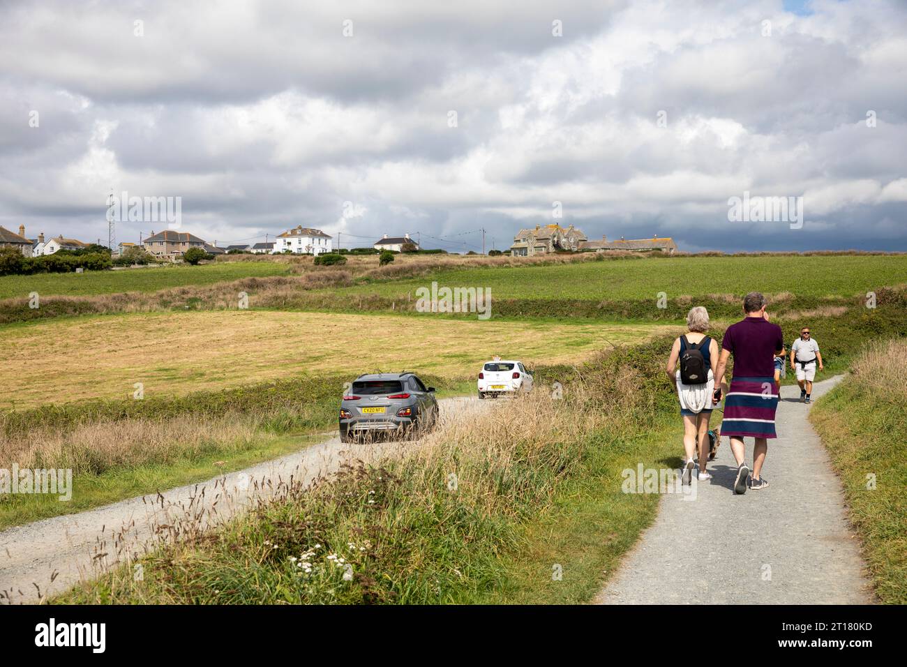 Lizard Point, couple walking from Lizard to Lizard Point Cornwall along ...