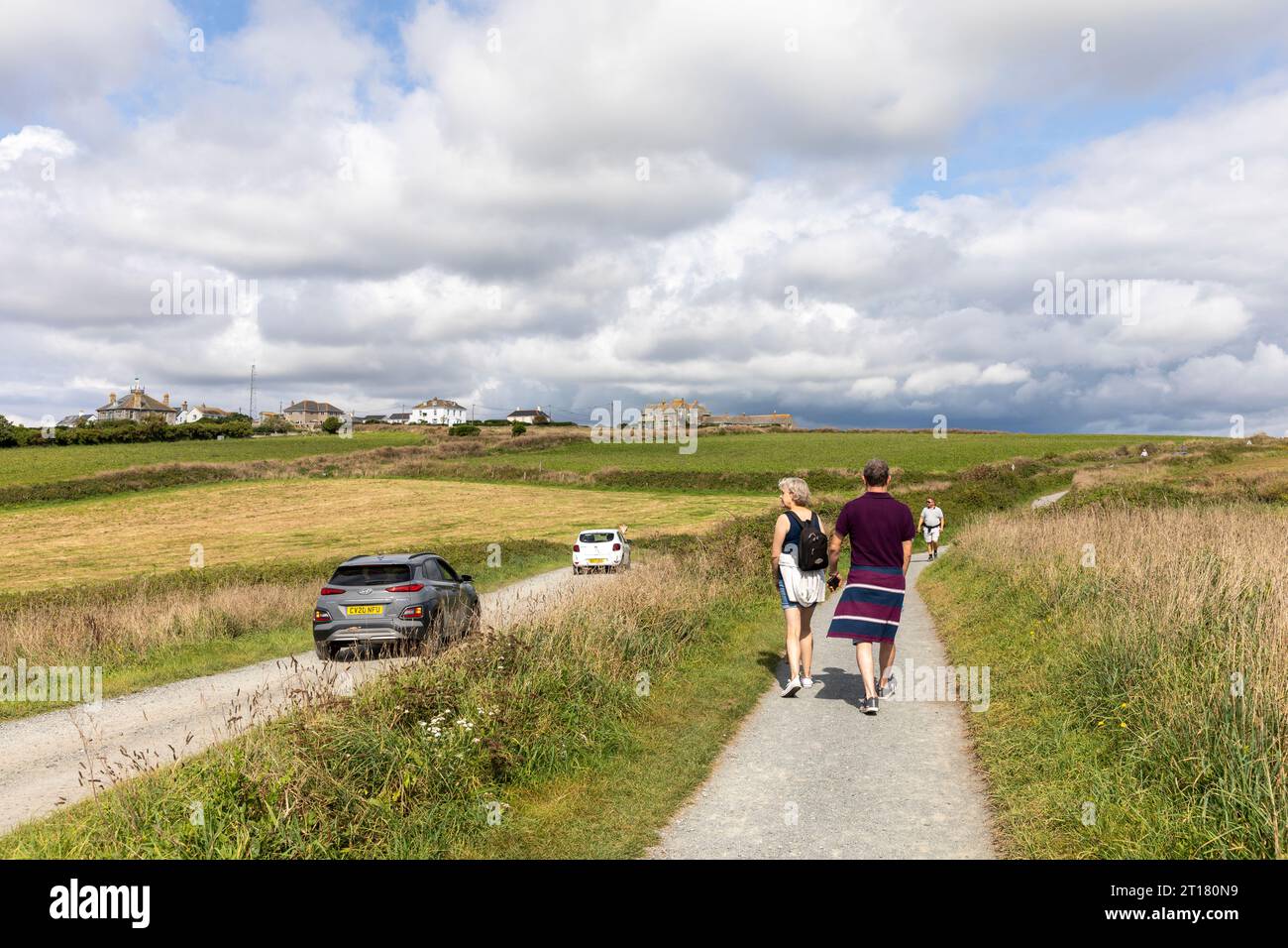 Lizard Point, couple walking from Lizard to Lizard Point Cornwall along ...