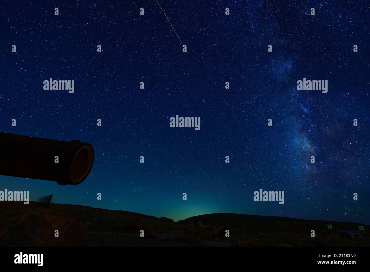 View of a starry night with the milky way, perseid meteor, and old ...