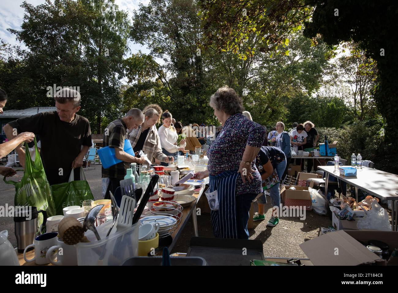 People attend a local community jumble sale in Southwest London ...