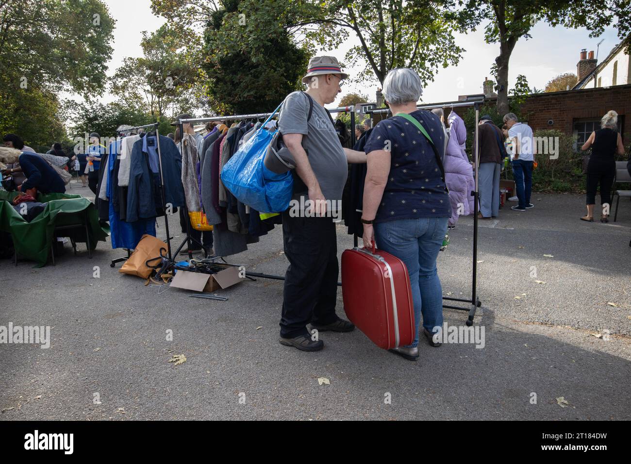 People attend a local community jumble sale in Southwest London ...