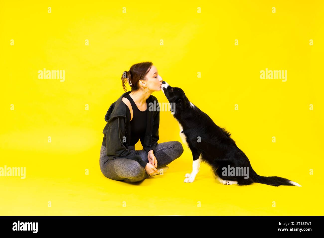Friendship between people and animals, studio shot, love, tender, warm ...