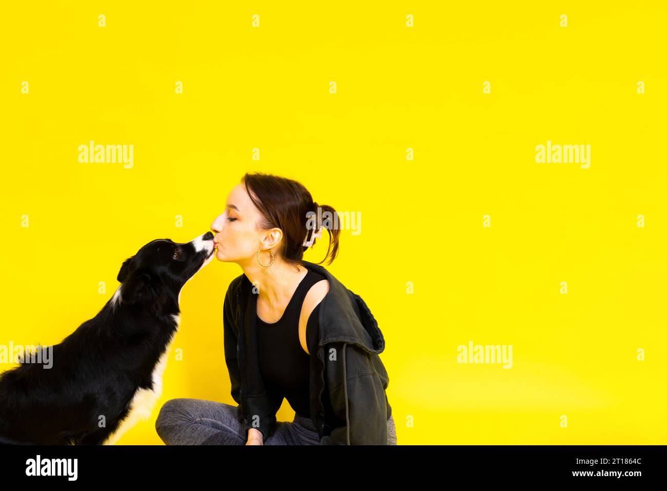Friendship between people and animals, studio shot, love, tender, warm ...