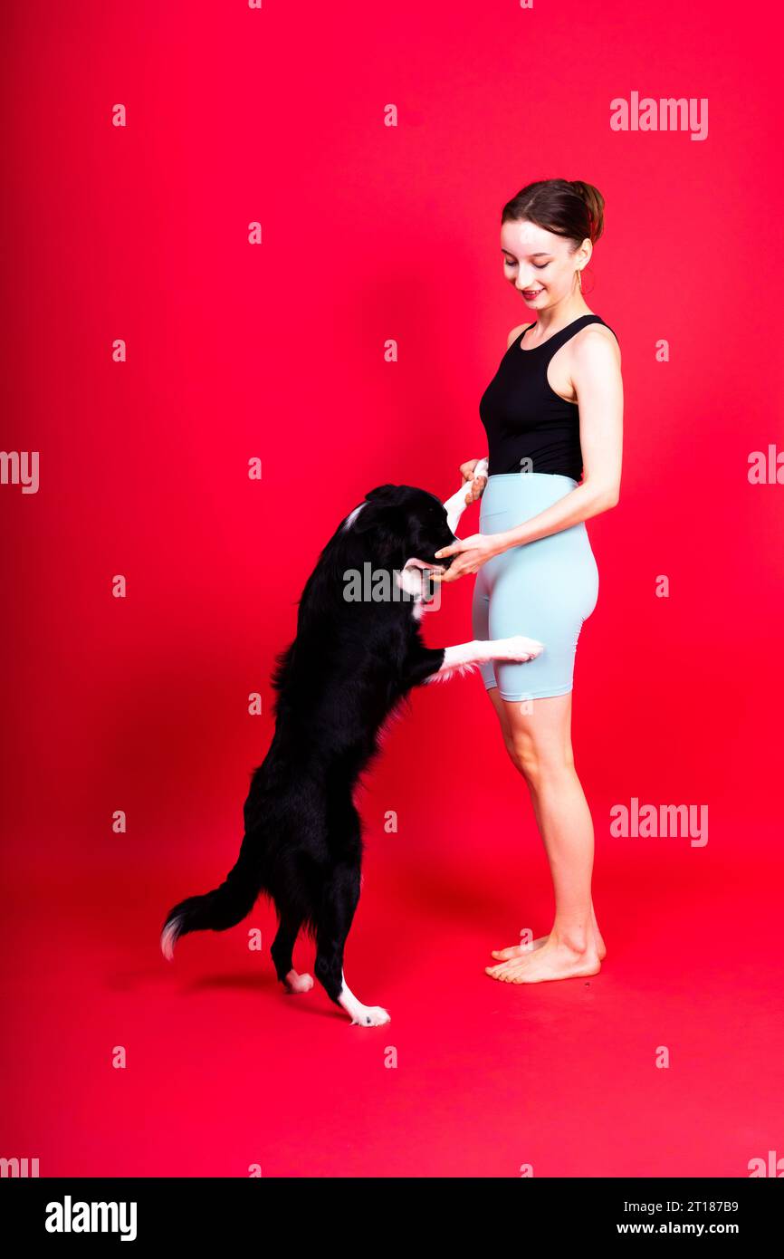 Friendship between people and animals, studio shot, love, tender, warm ...