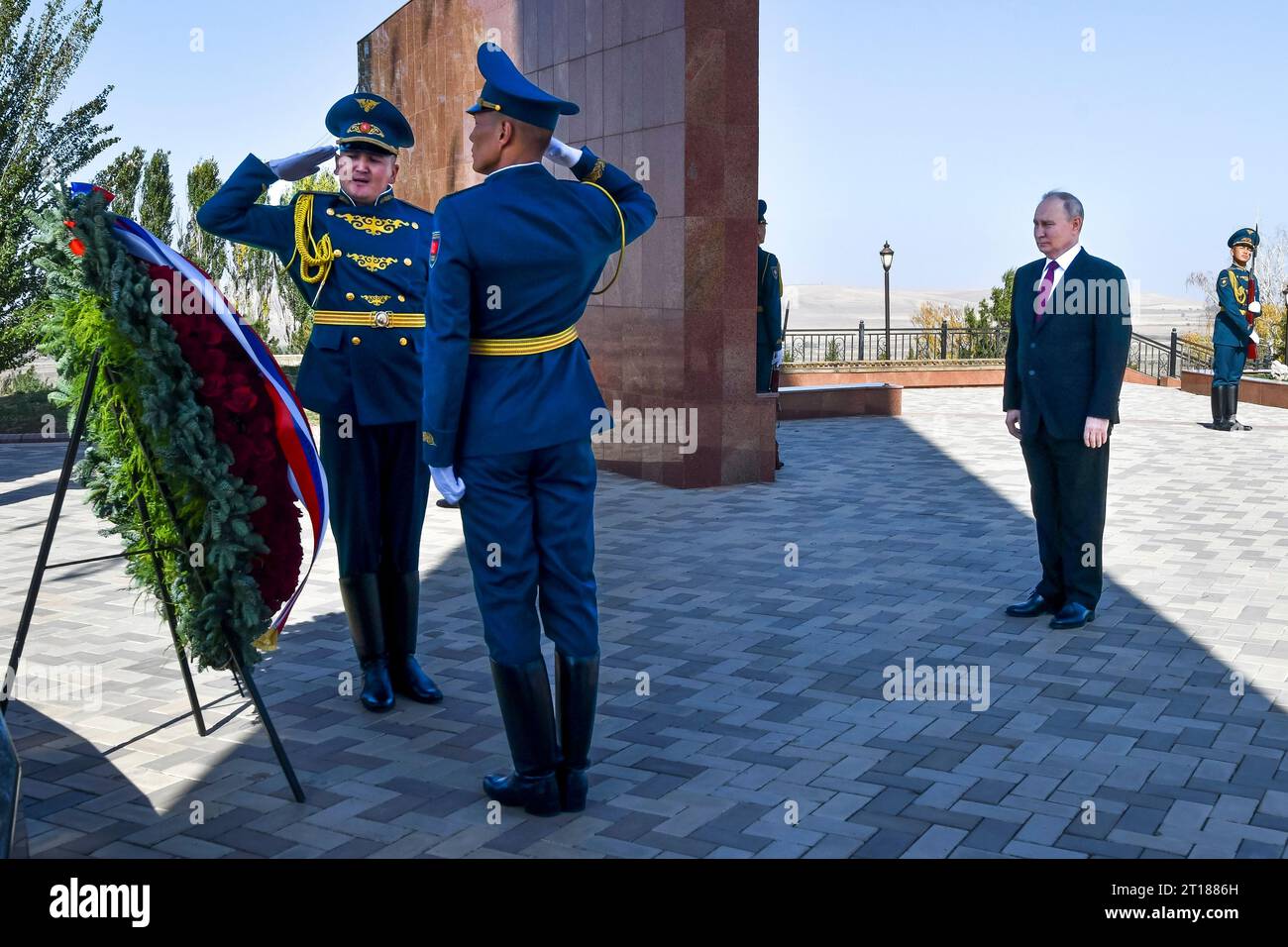 Russian President Vladimir Putin, right, attends a laying ceremony the ...