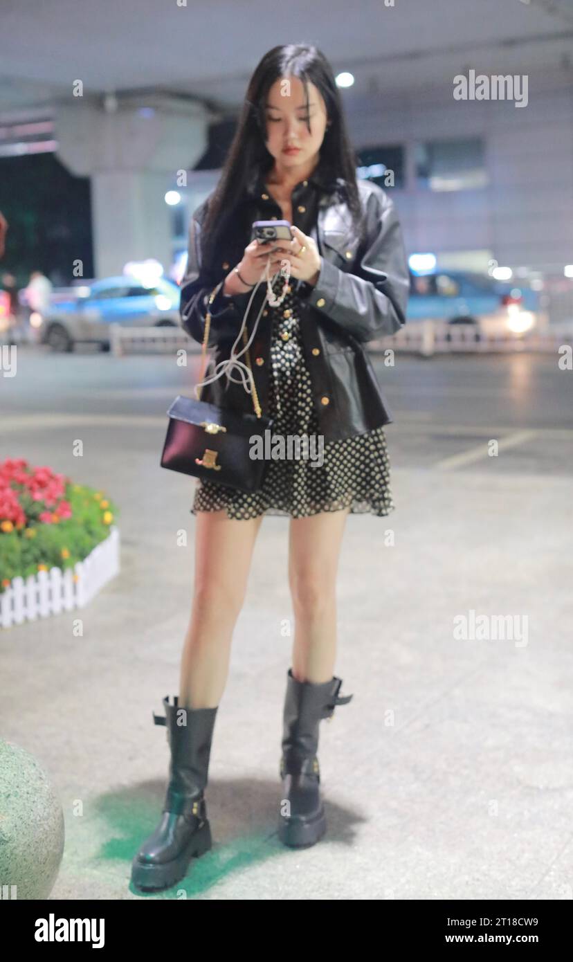 Chinese singer Huang Ling appears at the airport in Changsha City ...