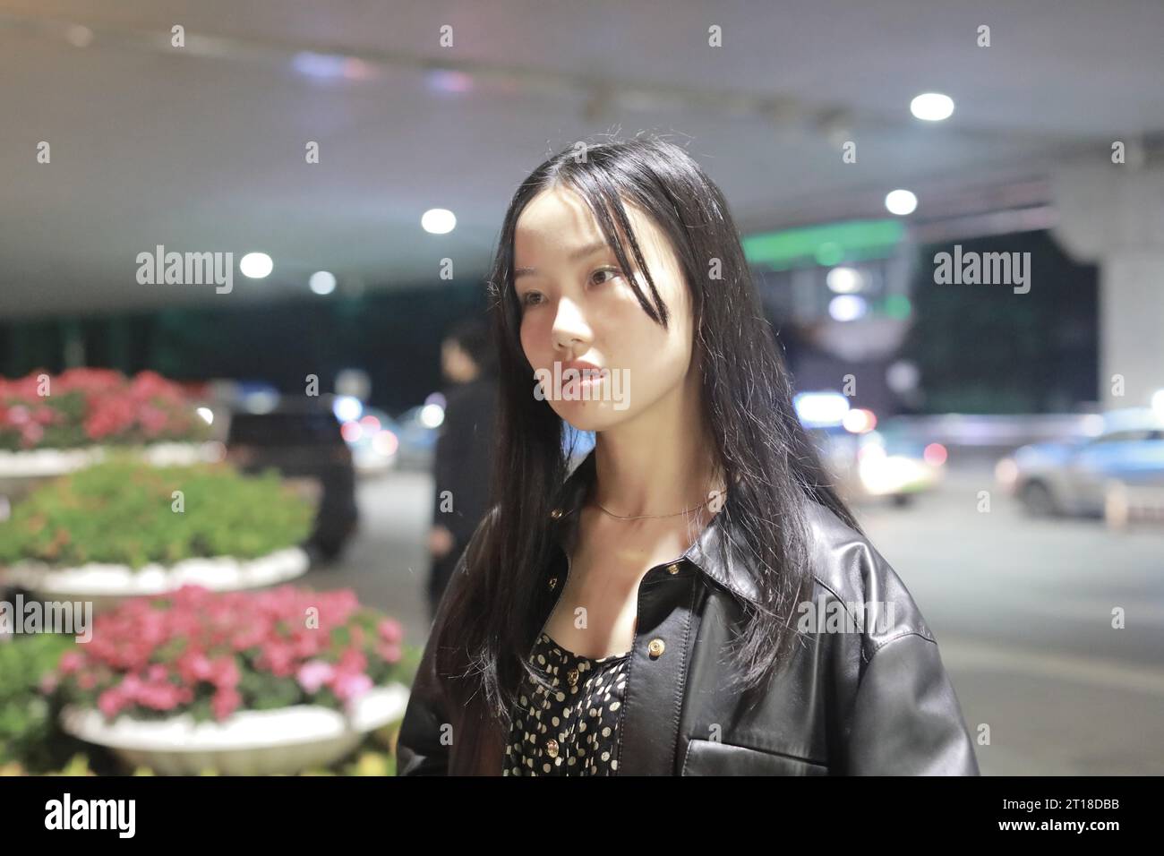 Chinese singer Huang Ling appears at the airport in Changsha City ...