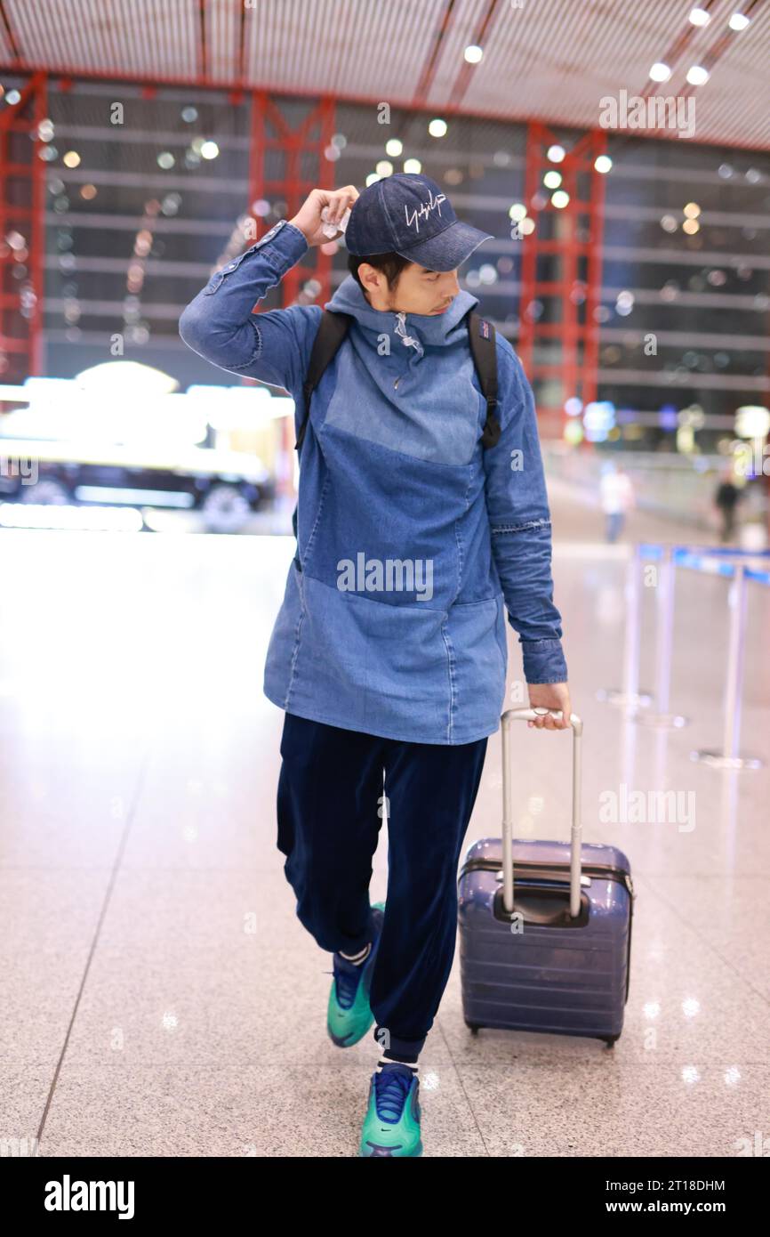 Chinese actor and swimmer Jin Shijia appears at the airport in Beijing ...