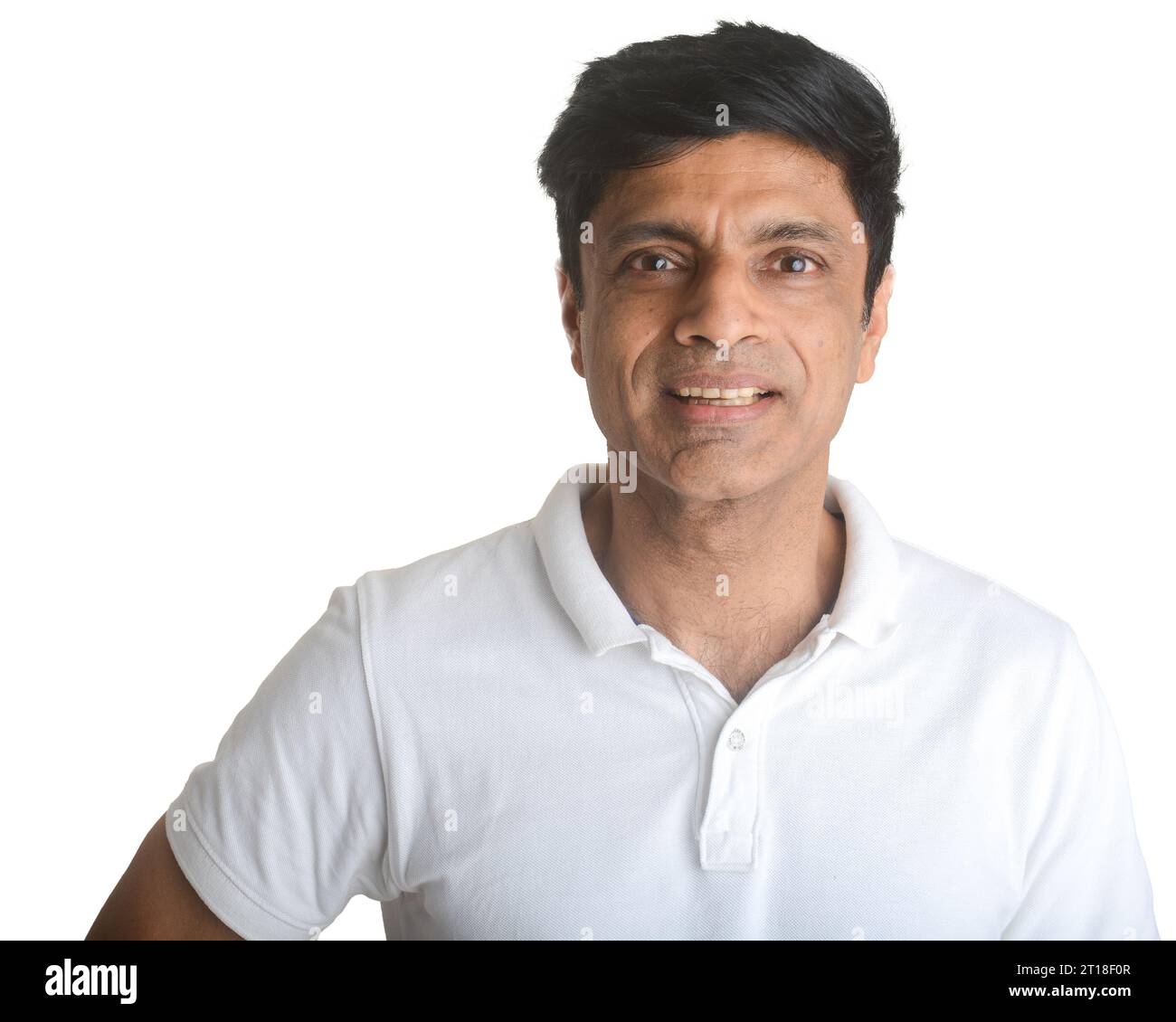 A smart middle-aged fit Indian man in a white t-shirt - studio shot ...