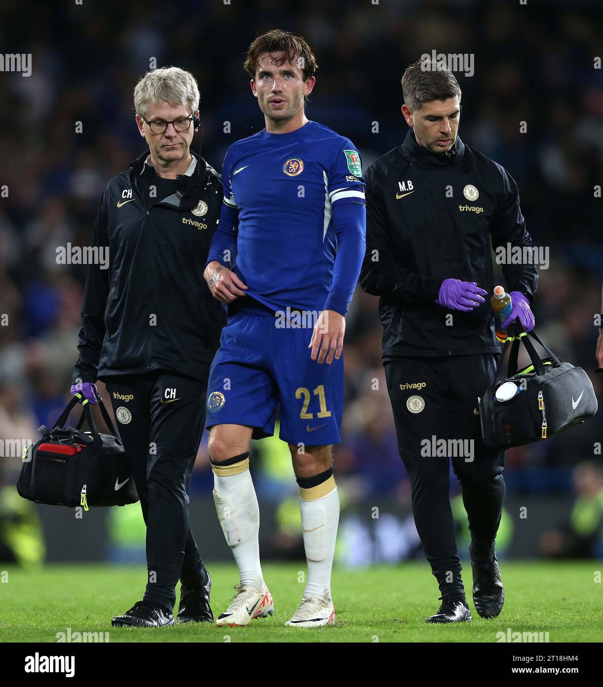 Ben Chilwell of Chelsea is taken off the pitch by medical staff after a ...