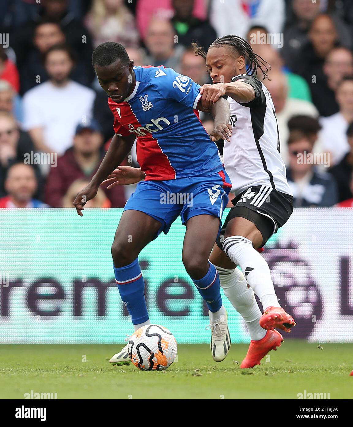 Tyrick Mitchell of Crystal Palace battles Bobby Reid of Fulham ...