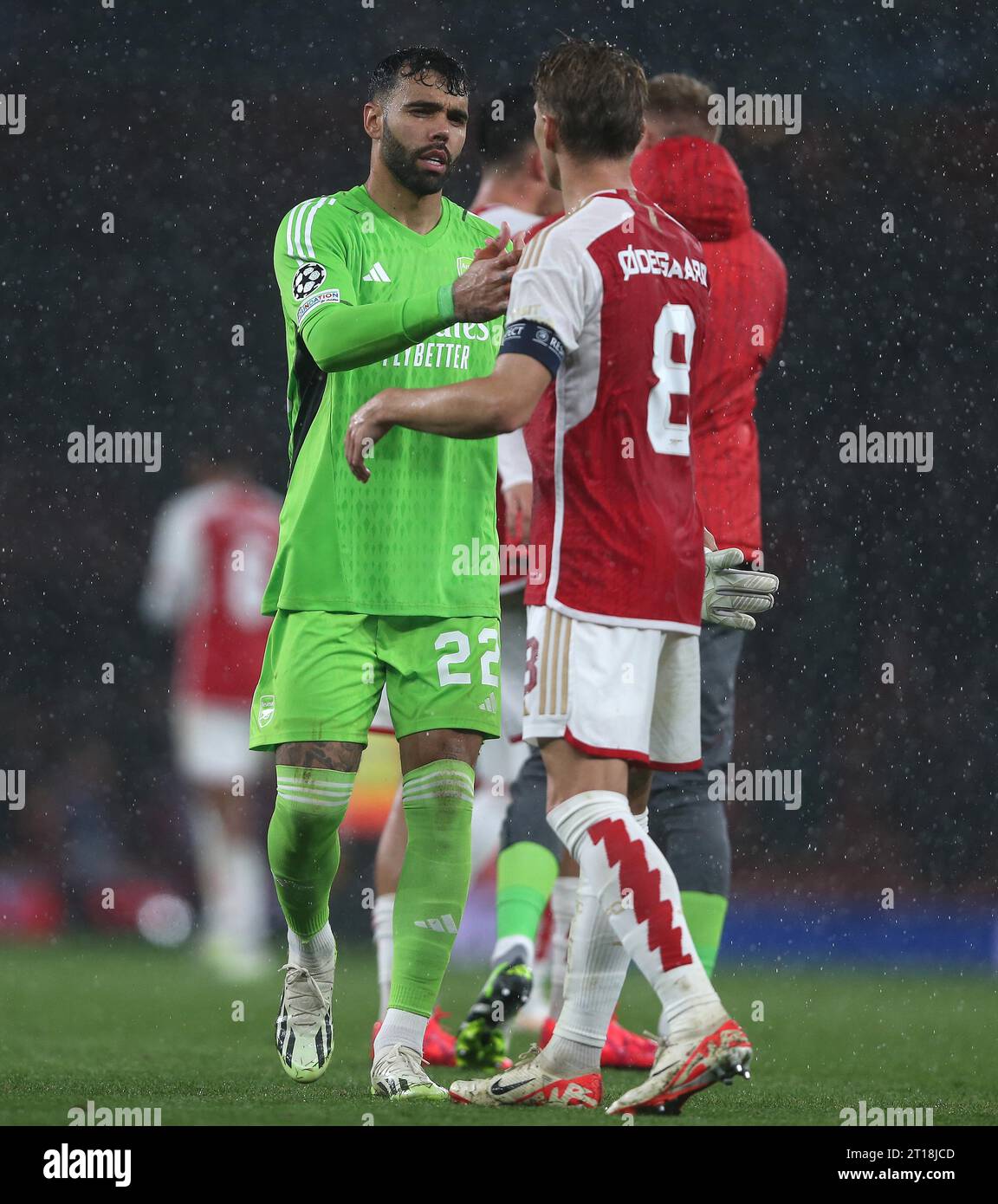 David Raya of Arsenal celebrate the 4-0 victory with Martin Odegaard of ...