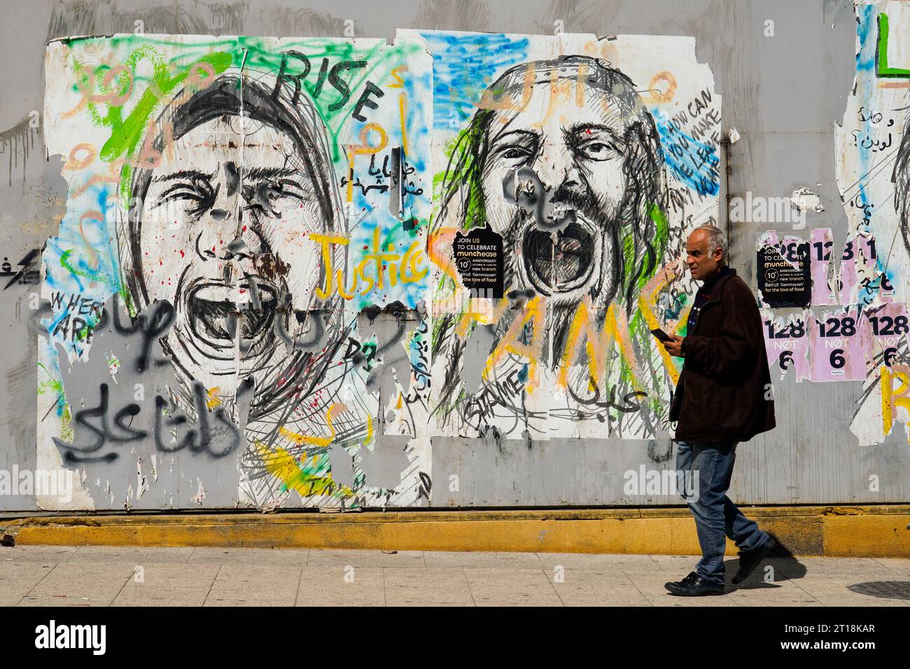 Beirut, Lebanon: A wall is painted with graffiti of screaming people at ...