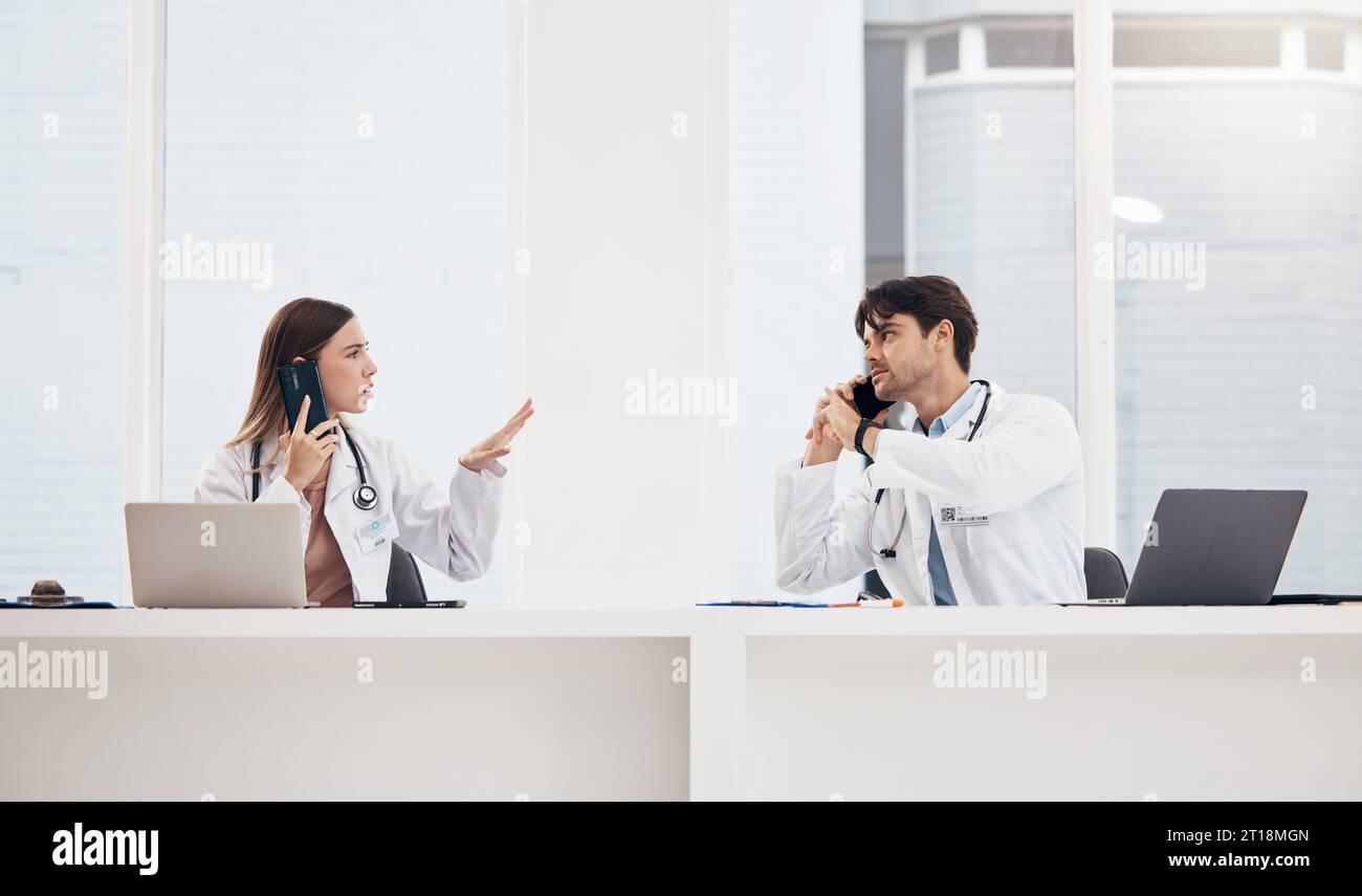 Doctors, phone call and healthcare at reception desk for communication ...