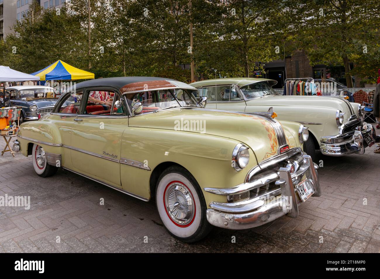 Two vintage American Pontiac cars, London Classic Car Boot Sale, King's ...