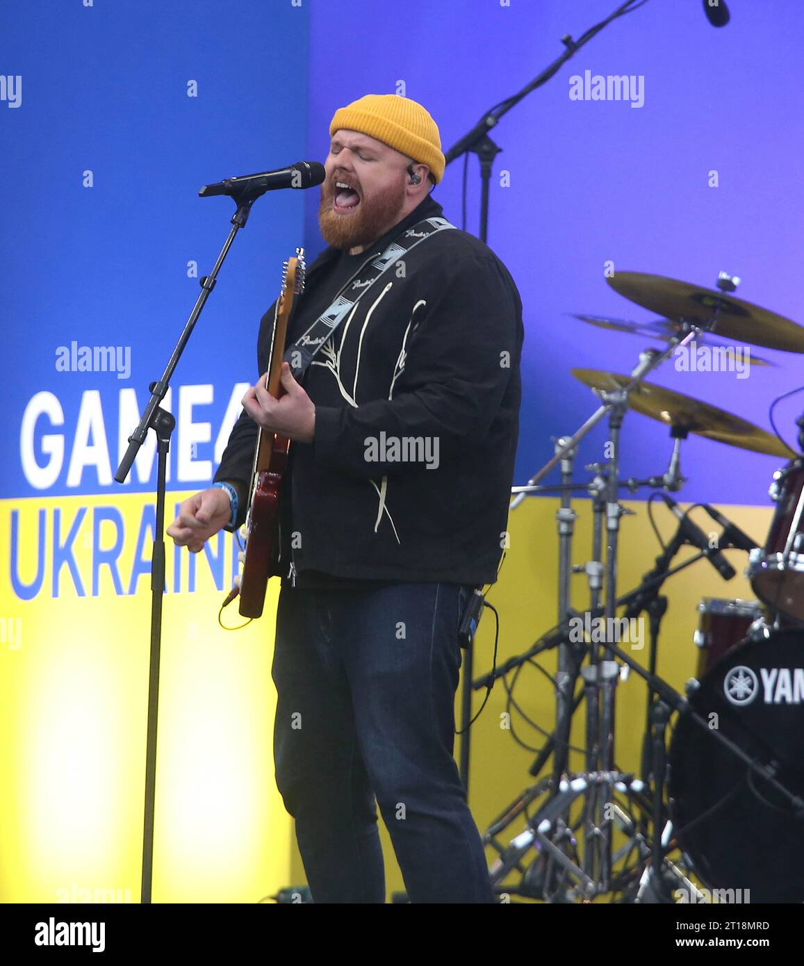 Tom Walker performs to the crowd at half time. - Yellow Team v Blue ...