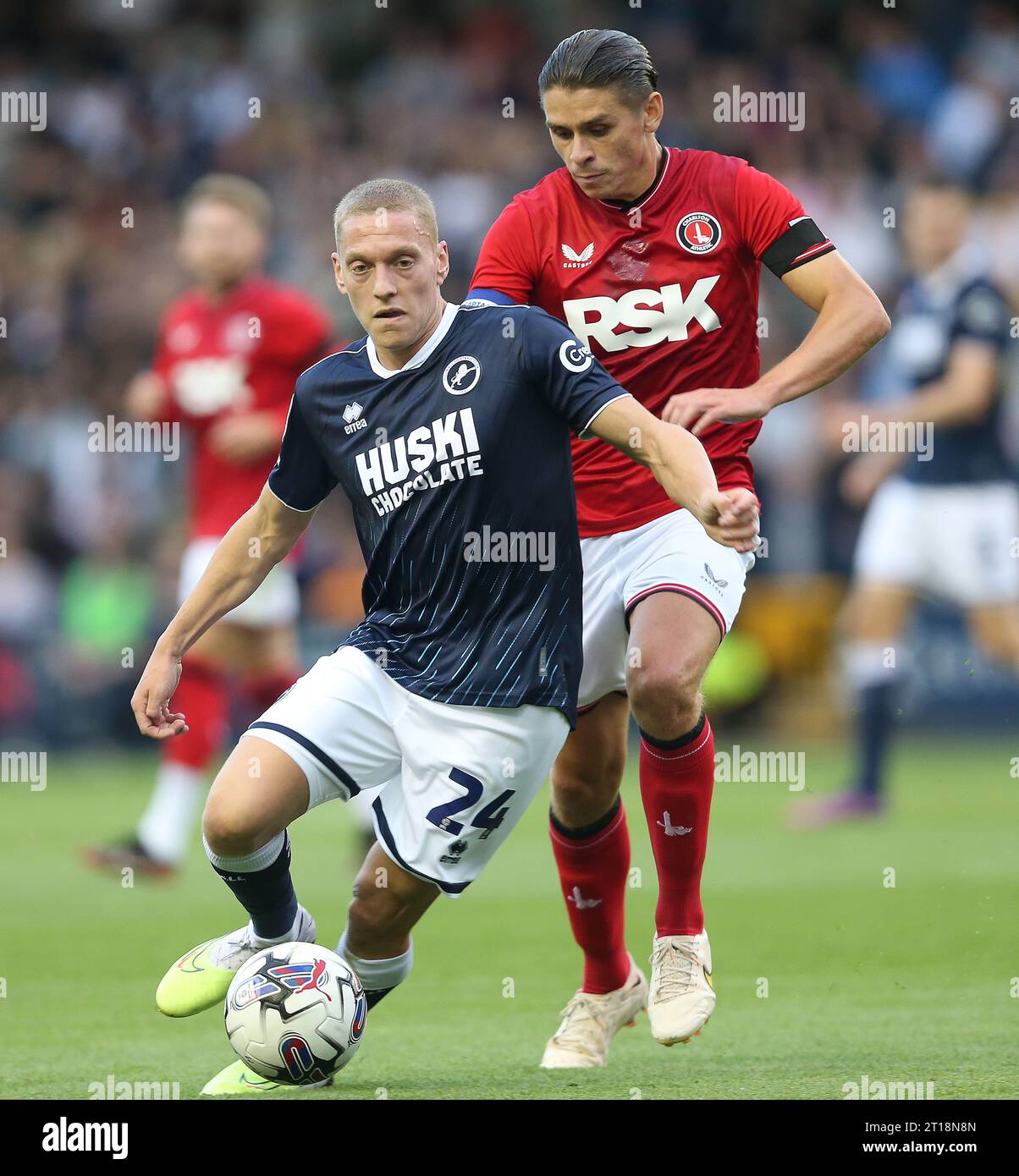 Casper De Norre of Millwall battles George Dobson of Charlton Athletic ...