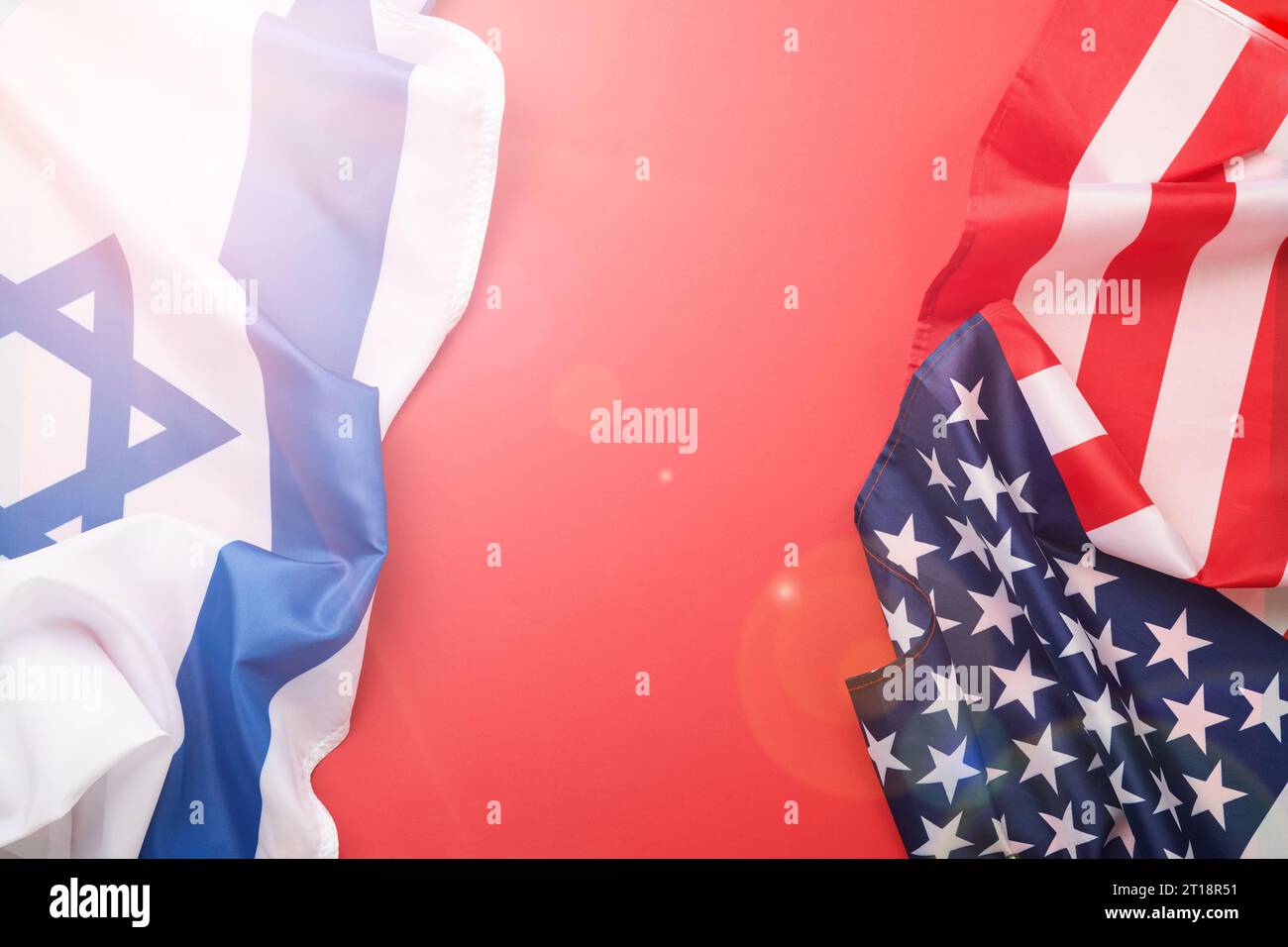 USA Israel flags. Two American and Israeli flags lie on red texture ...