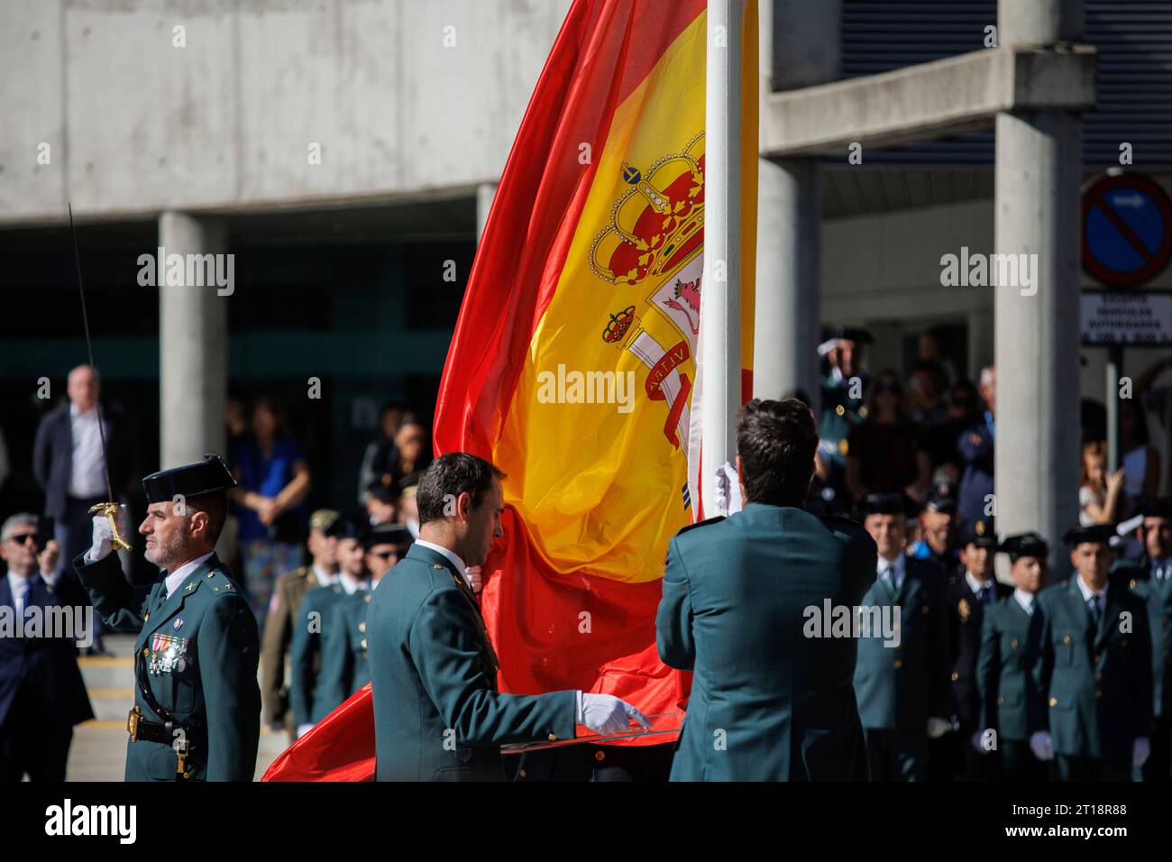 Civil Guards raise the Spanish flag during the celebration in honor of ...