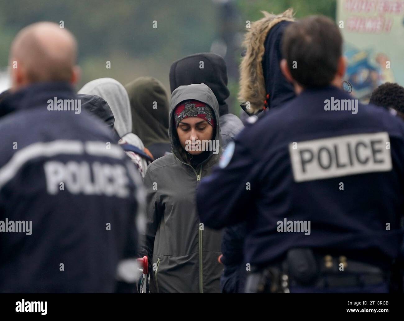 People thought to be migrants are dispersed in Grande-Synthe, northern ...