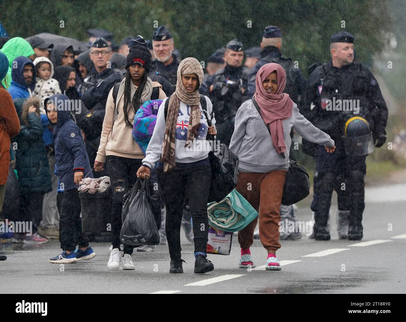 People thought to be migrants are dispersed in Grande-Synthe, northern ...