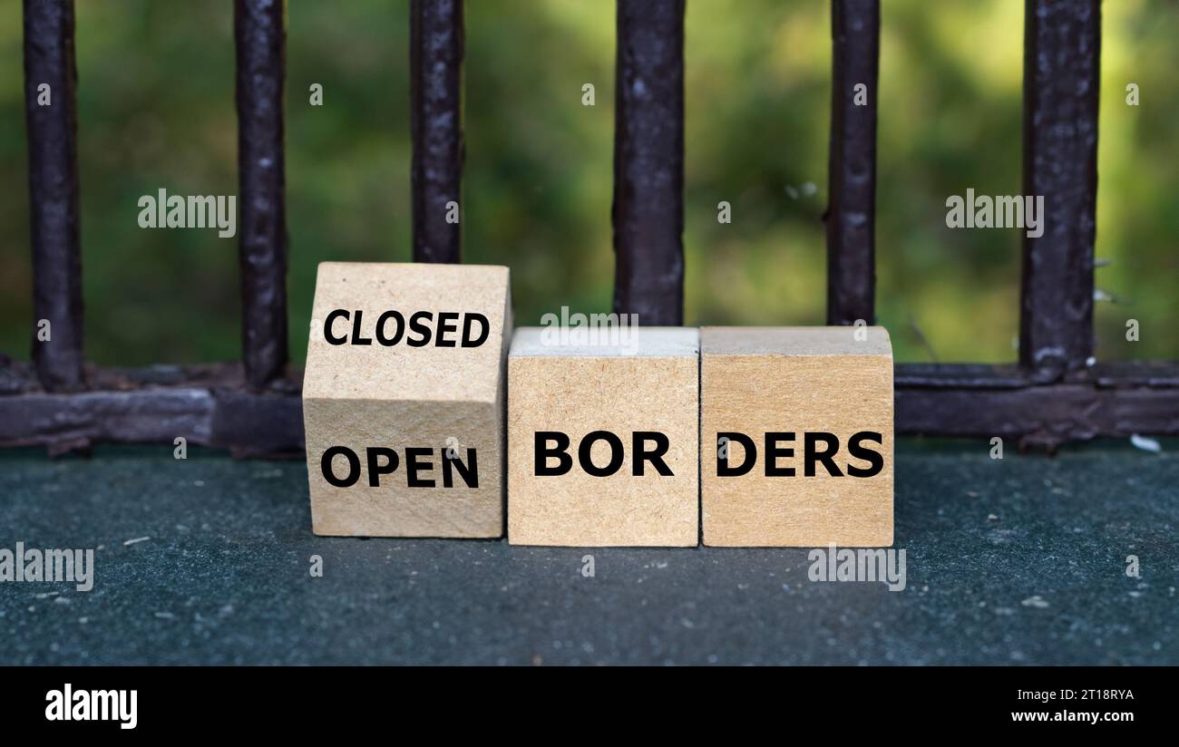Wooden cubes form the expressions 'open borders' and 'closed border' Stock Photo - Alamy