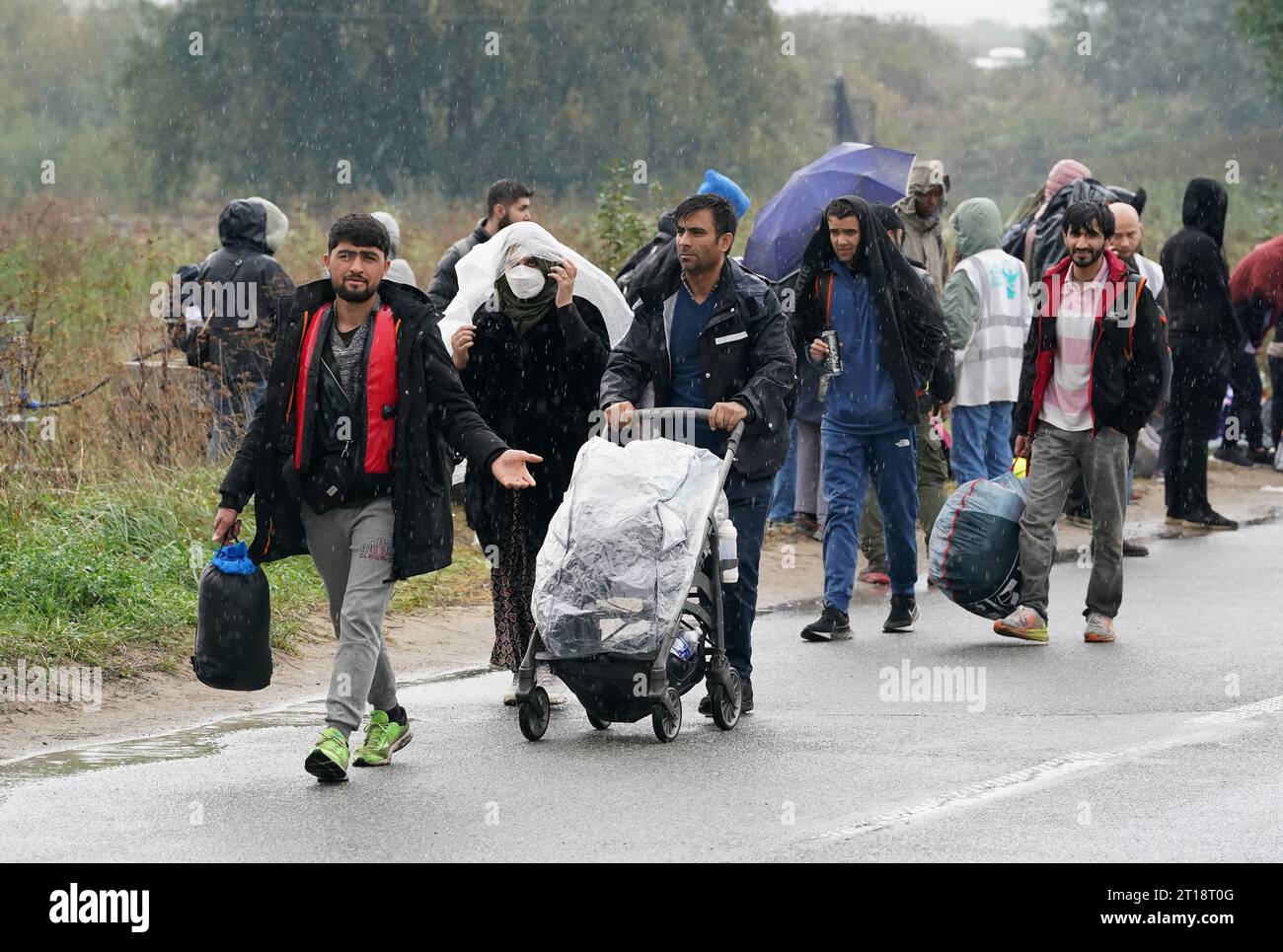 People thought to be migrants are dispersed in Grande-Synthe, northern ...