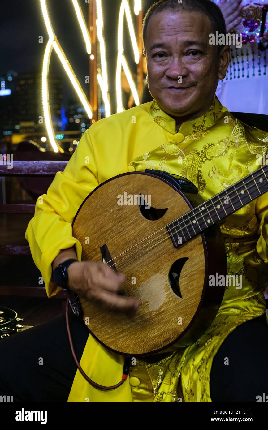 Ho Chi Minh City, Vietnam. Dan Nguyet, Moon Guitar, Played by ...