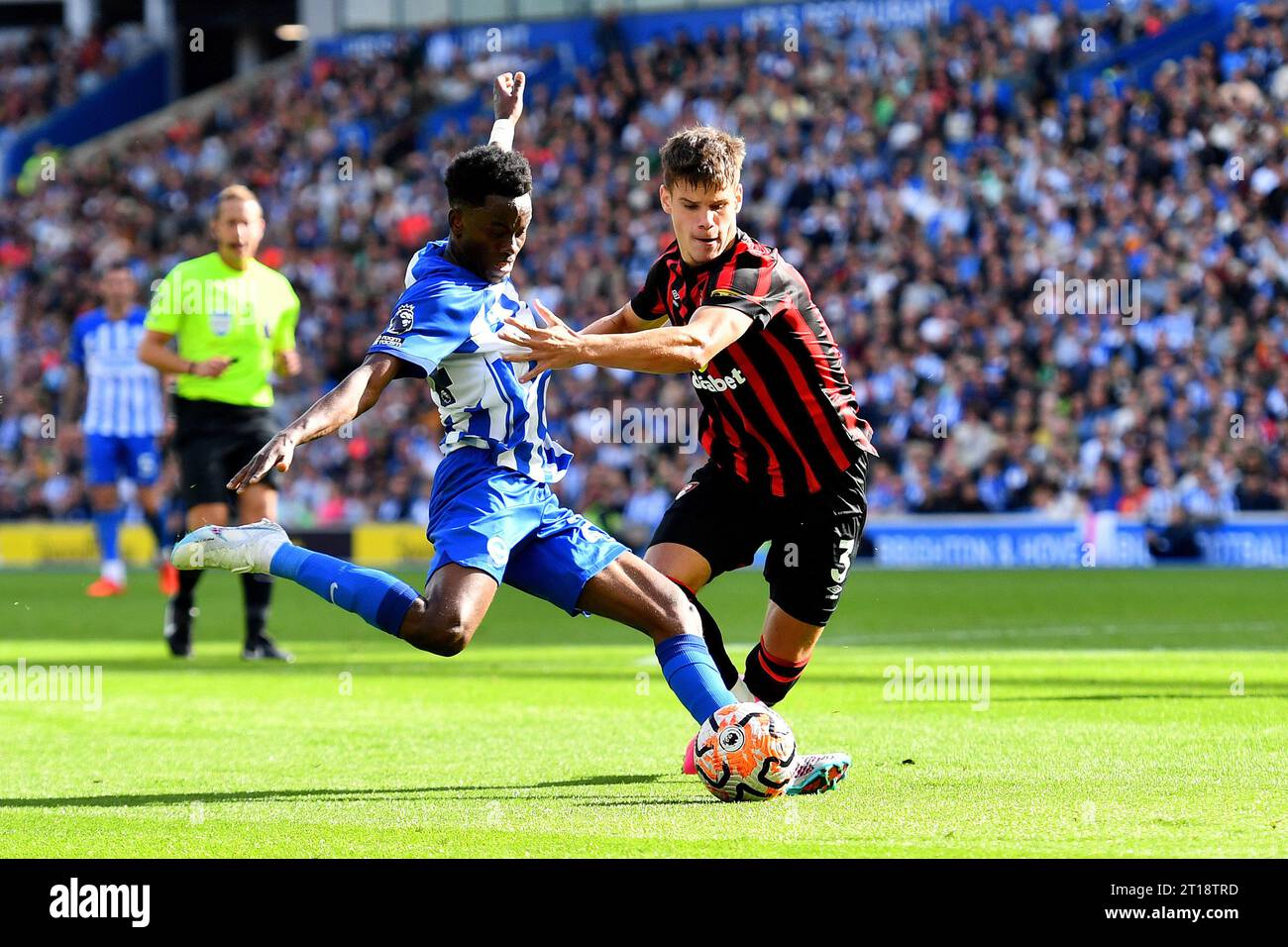 Simon Adingra of Brighton and Hove Albion and Milos Kerkez of AFC ...