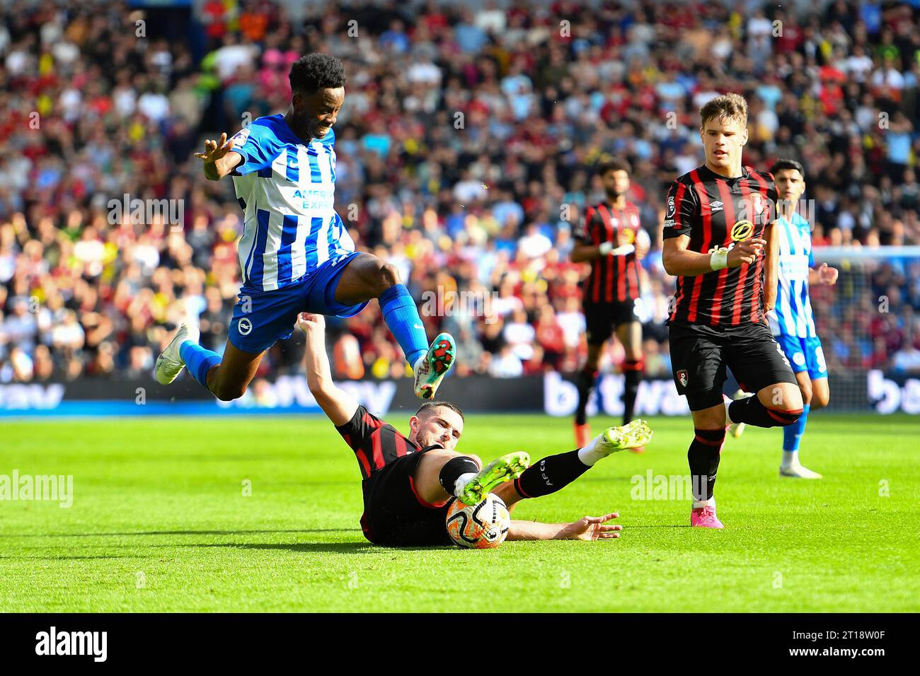 Lewis Cook of AFC Bournemouth tacklesSimon Adingra of Brighton and Hove ...