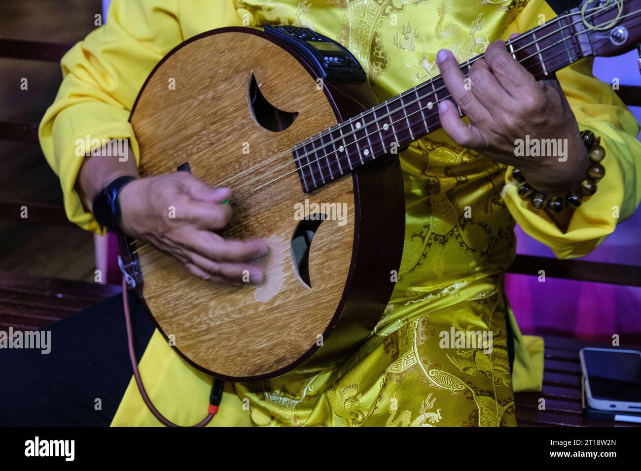 Vietnam, Ho Chi Minh City. Dan Nguyet, Moon Guitar, Played by ...
