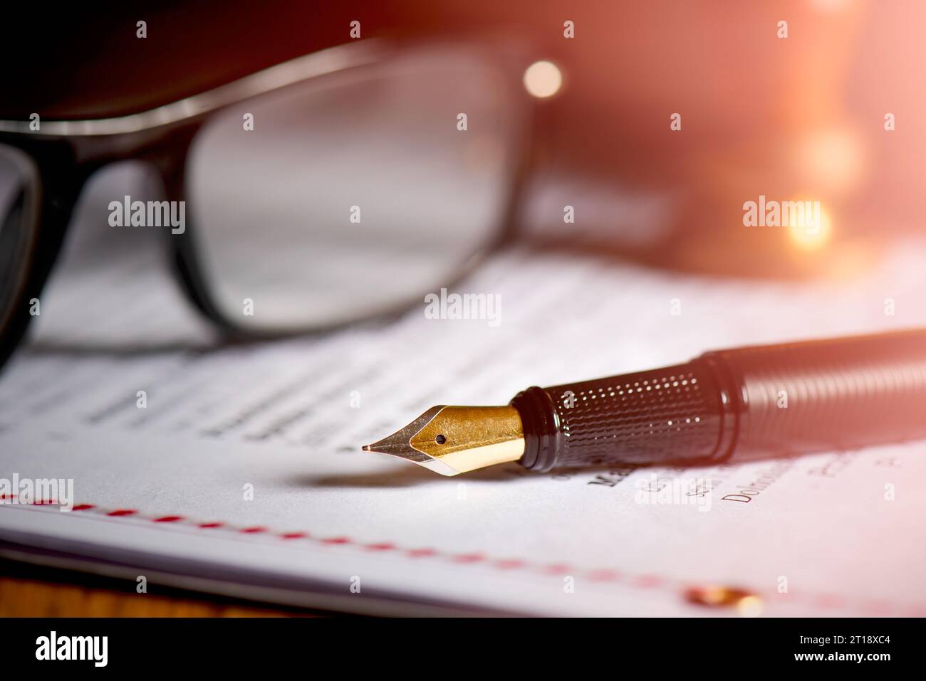 Law, notary background theme. Fountain pen and documents on desk Stock ...