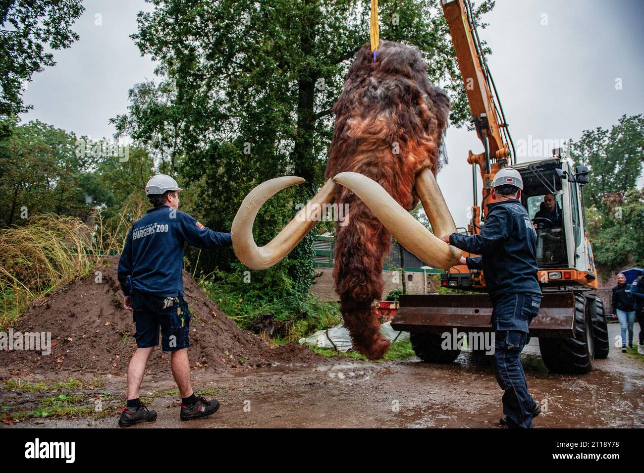 The technicians with the help of a forklift truck are seen moving the ...