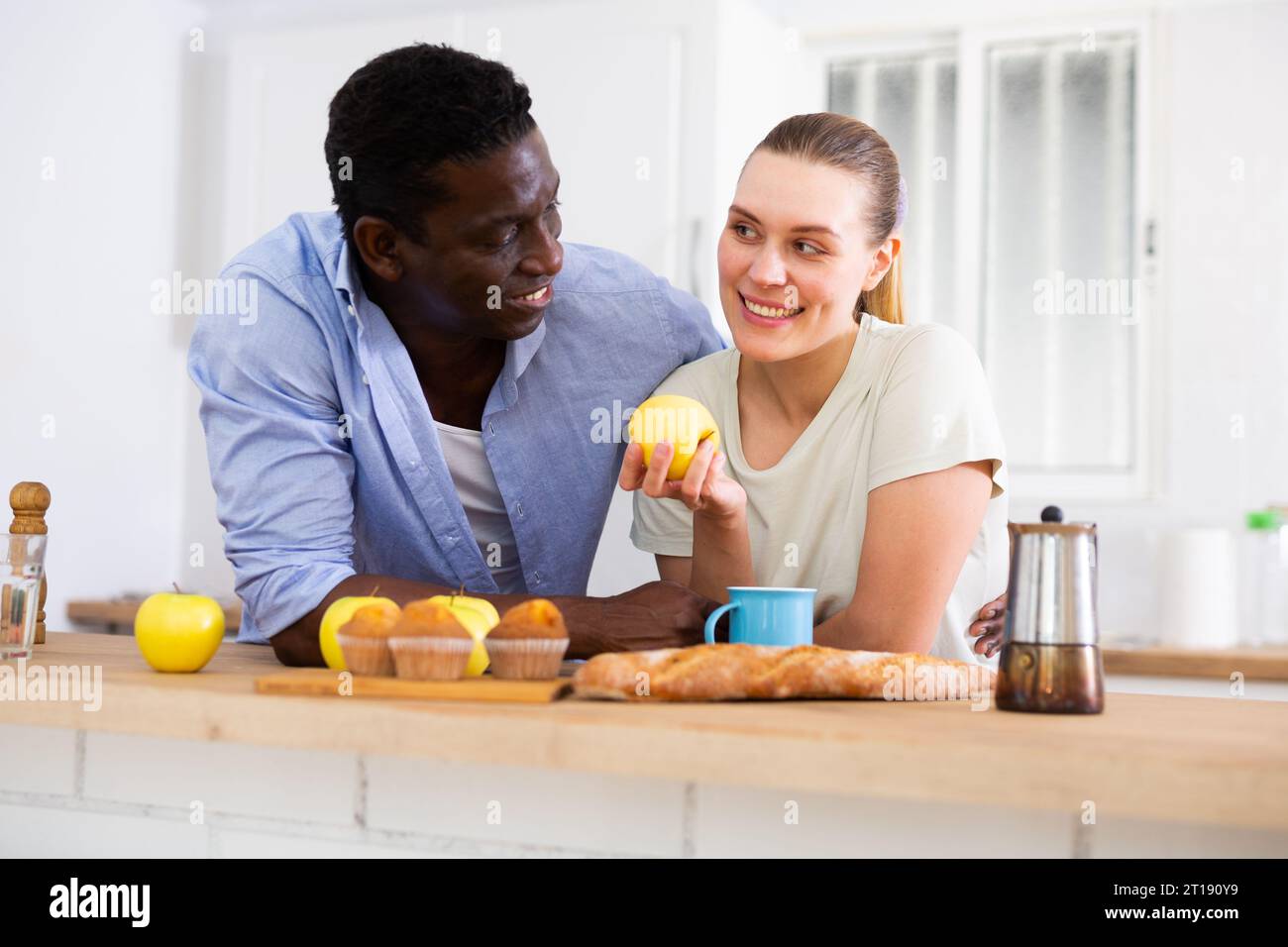 Young biracial couple relaxing in hi-res stock photography and images ...