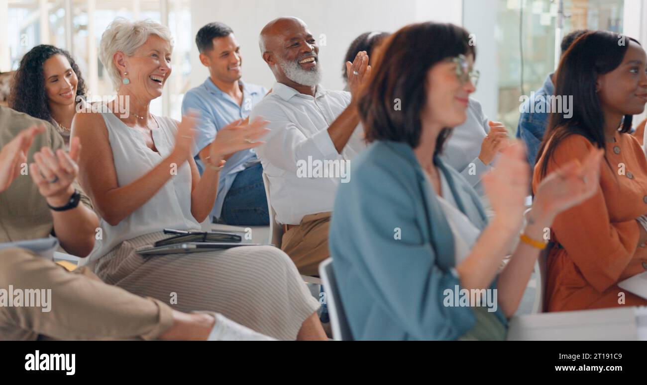 Audience, happy and clapping in seminar for presentation, convention ...