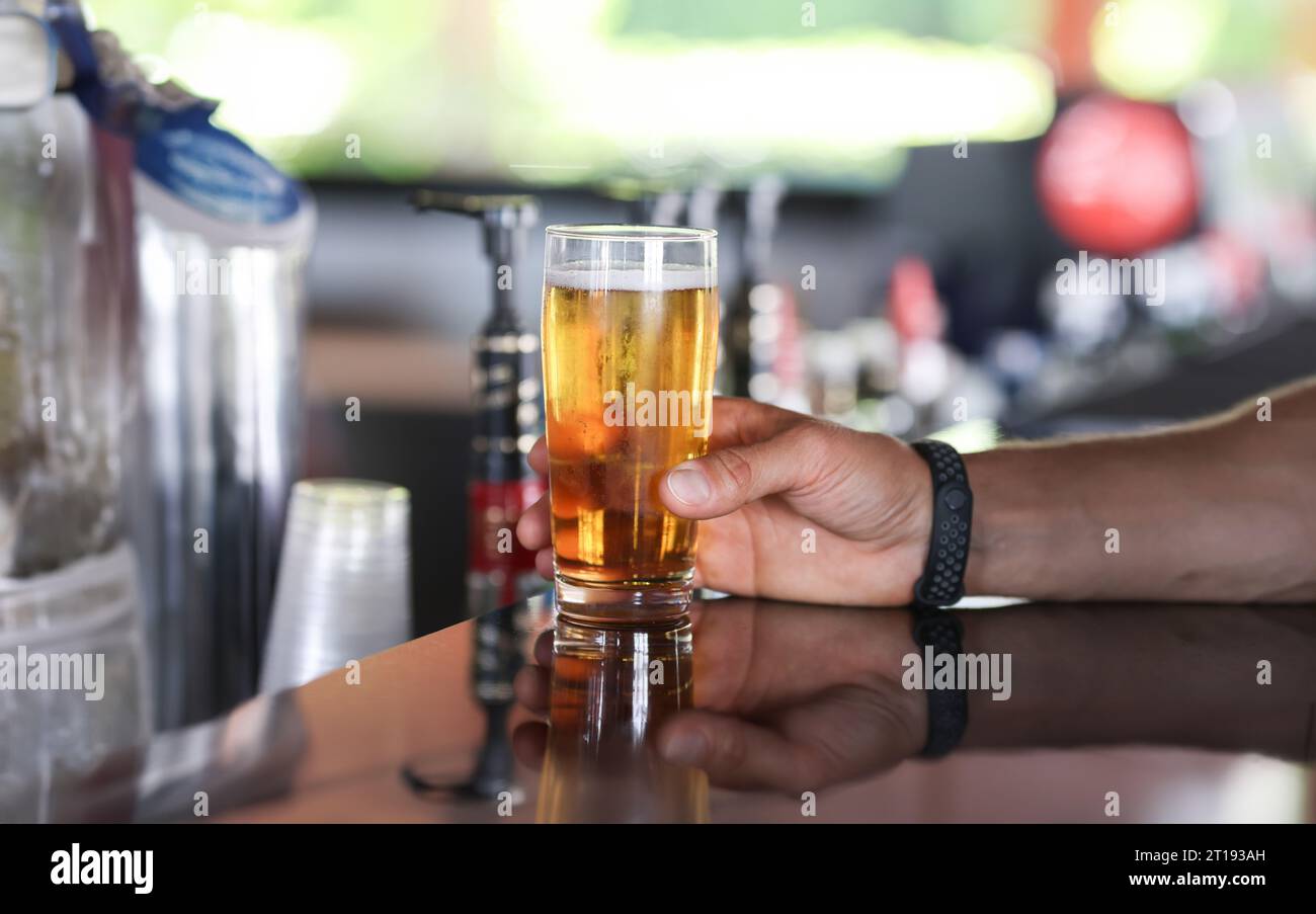 Hand holds gold bar hi-res stock photography and images - Alamy