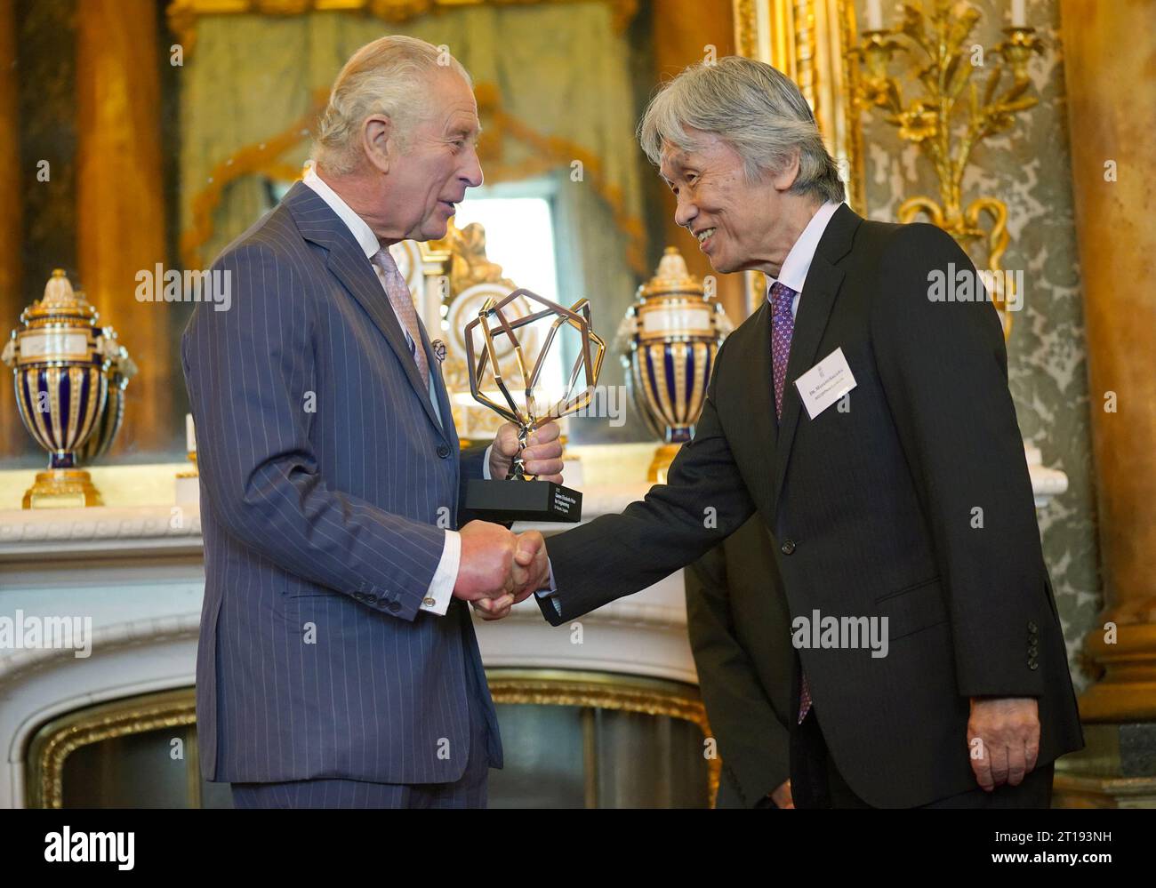 King Charles III presents Dr Masato Sagawa of Japan with the 2022 Queen ...