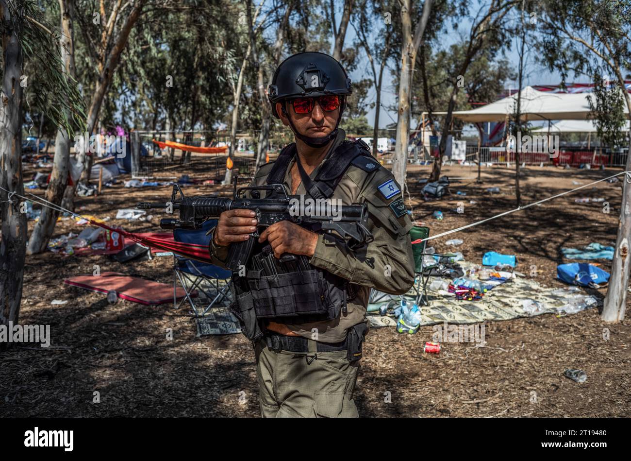 12 October 2023, Israel, Re'im: An Israeli soldier patrol at the site ...