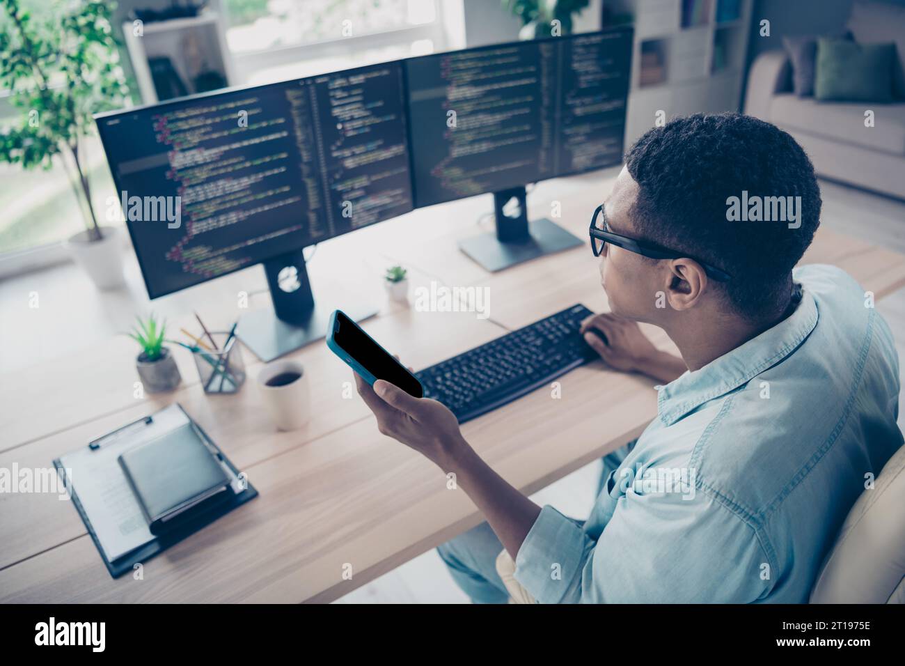 Side view photo of busy coder hacker young guy working office trying ...