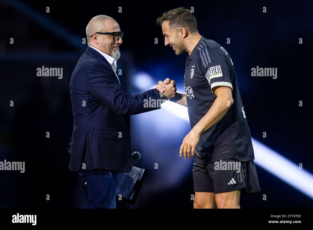 Alessandro Del Piero shakes hands with Marco Dejana (DJ Nana) during ...