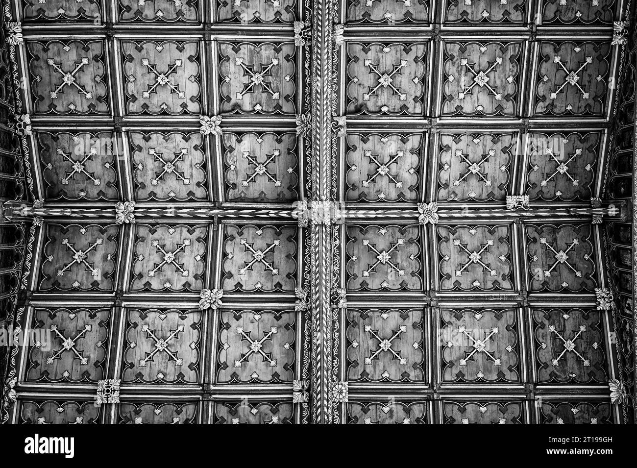 A metal ceiling decorated in a unique grid pattern with multiple ...