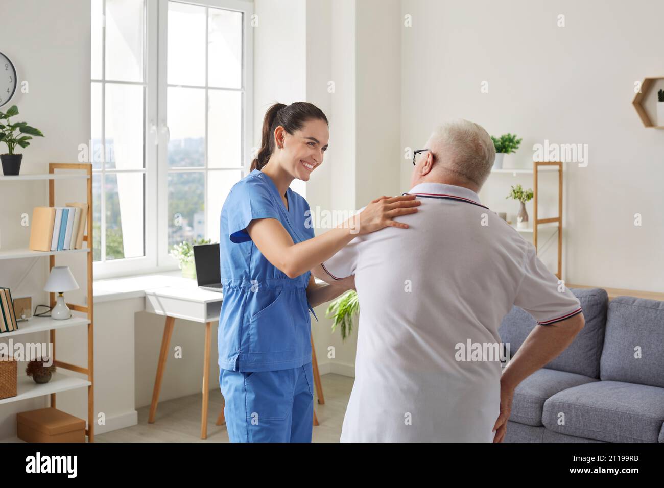 Physiotherapy training with physical exercises of old man with young ...